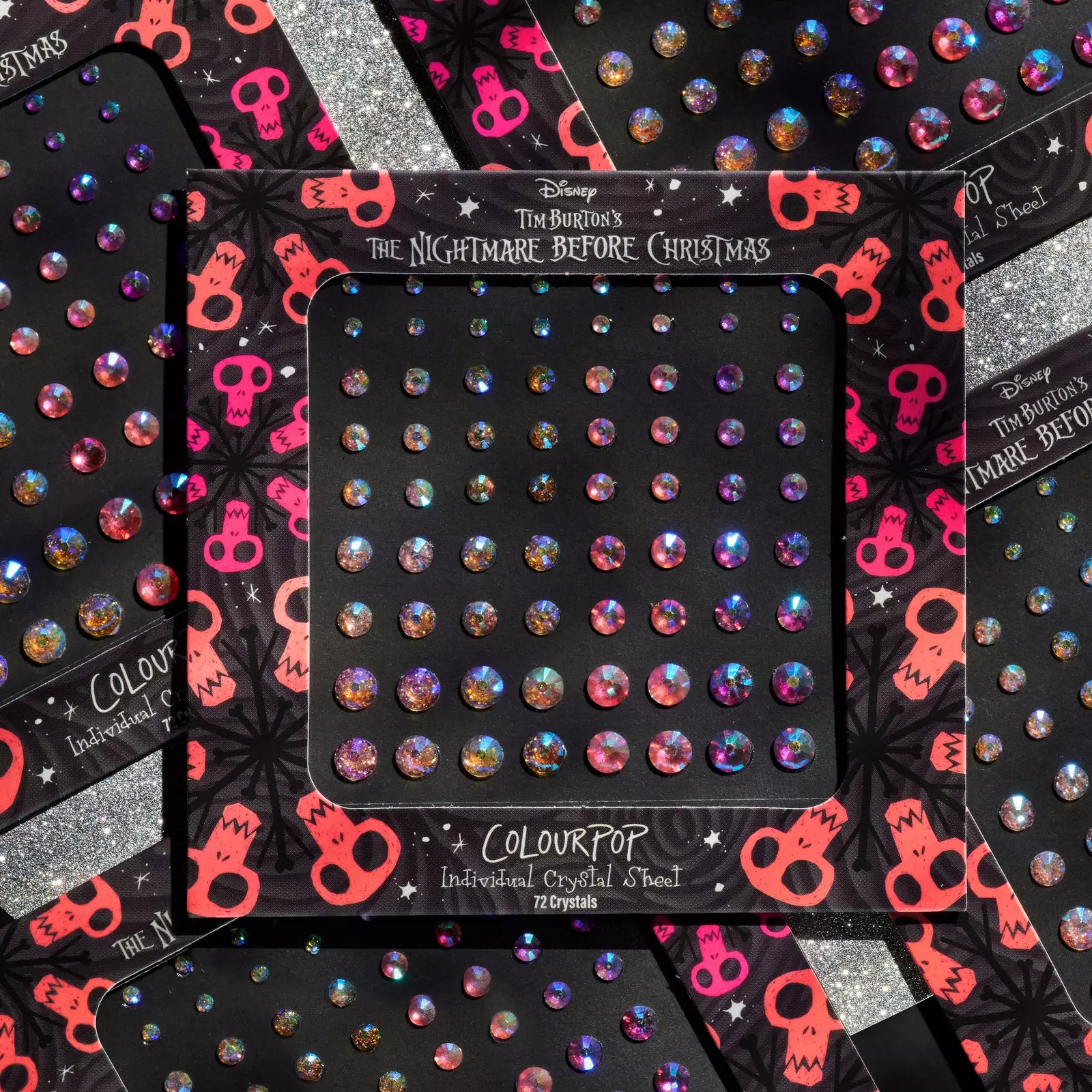 Colourpop Cosmetics' Nightmare Before Christmasinspired face crystals with an cord background