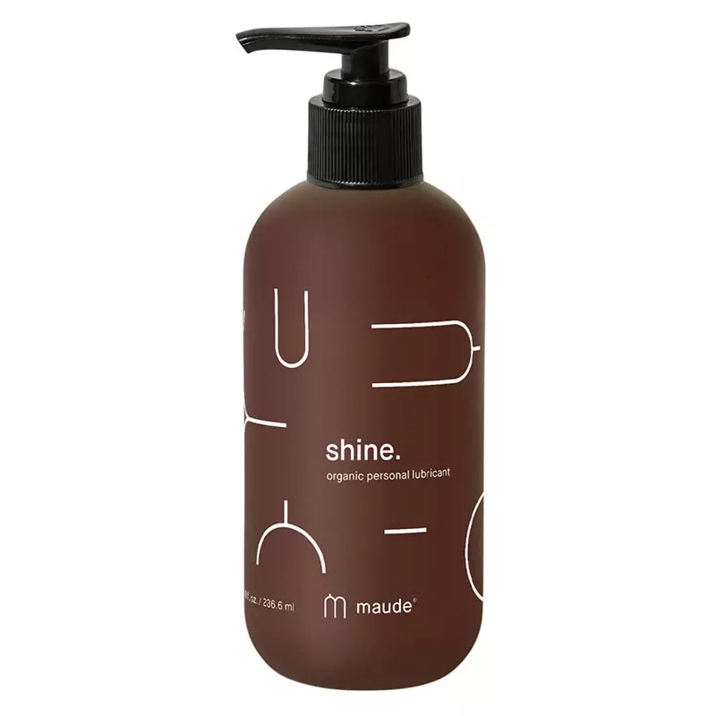 በነጭ ዳራ ላይ የ Maude Shine Personal Lubricant ቡናማ ጠርሙስ