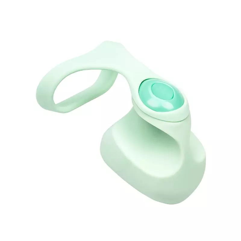 Hoton Dame Fin Finger Vibrator a cikin inuwa Jade akan wani farin bango