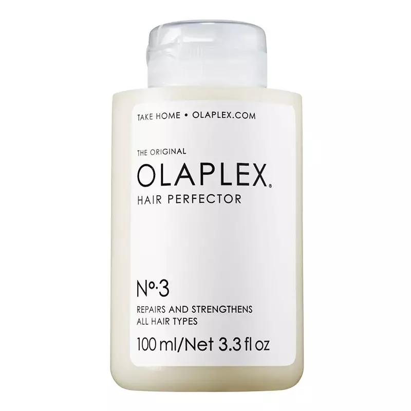 Ibhodlela le-Olaplex No. 3 Hair Perfector kungemuva elimhlophe